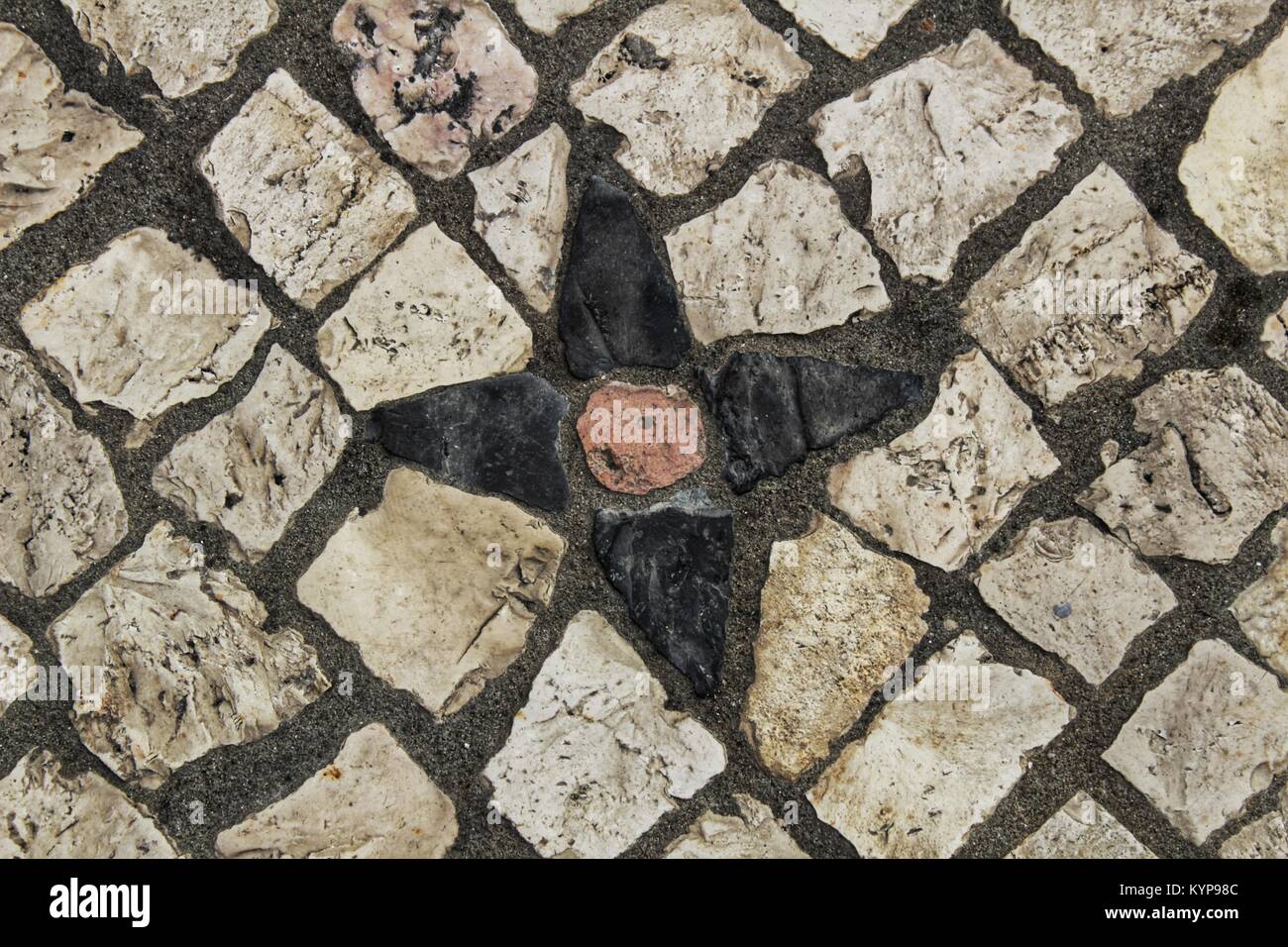 Cobblestone forming a star in Lisbon Stock Photo - Alamy