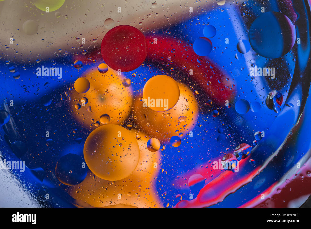 Colorful abstract macro background with oil drops in water Stock Photo ...