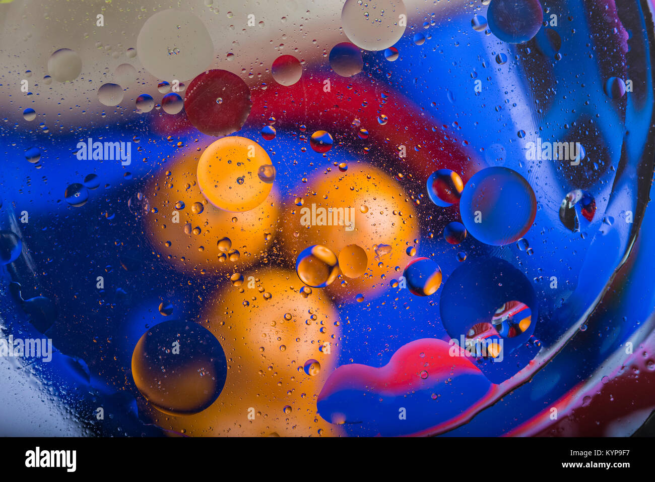 Colorful abstract macro background with oil drops in water Stock Photo ...