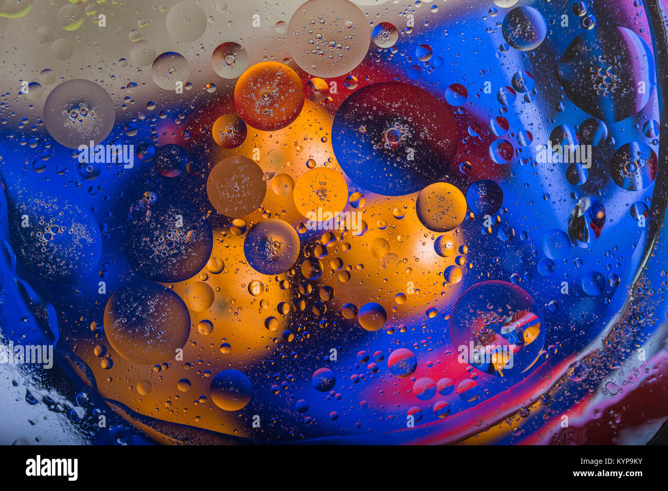 Colorful abstract macro background with oil drops in water Stock Photo ...