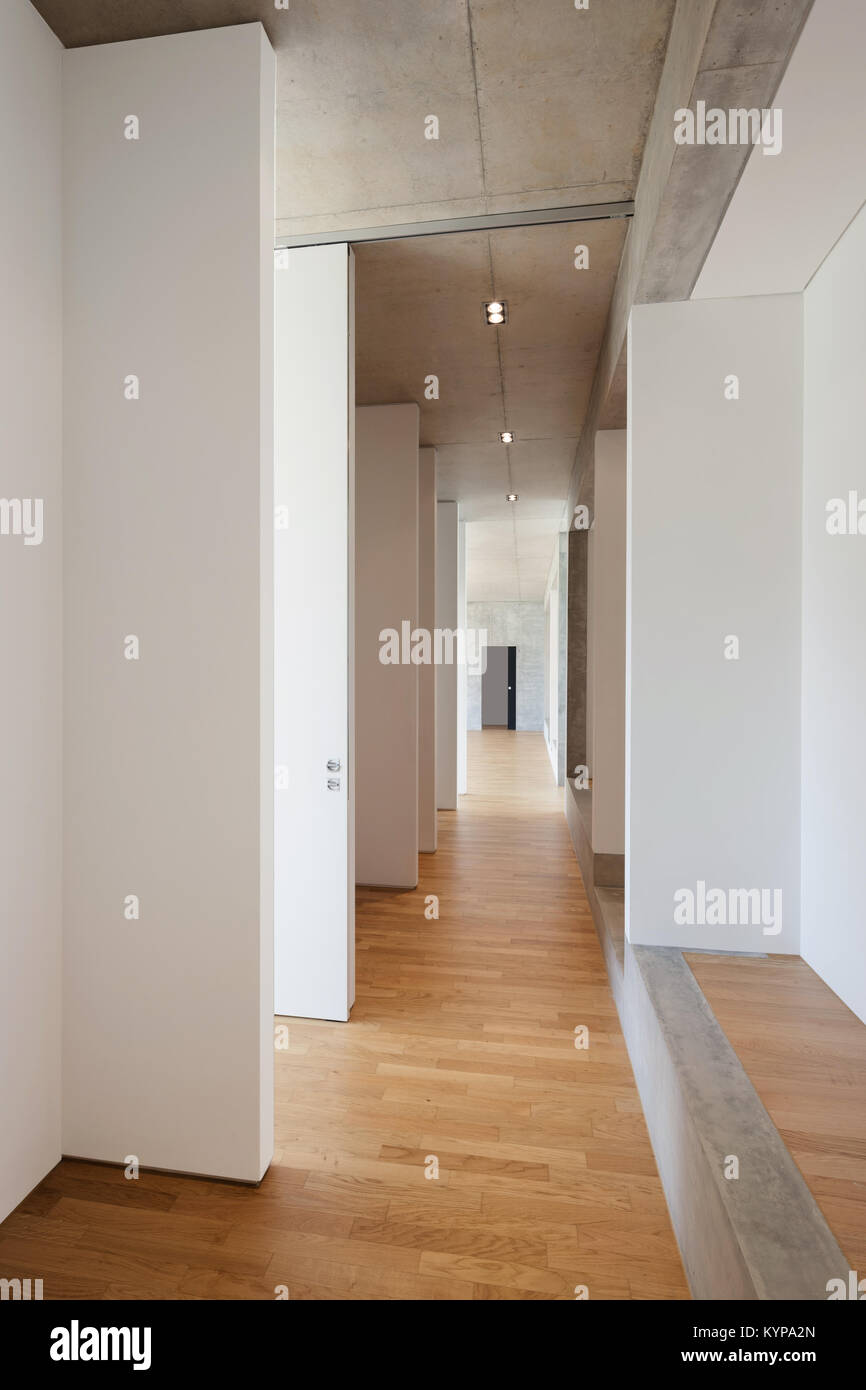 Architecture, empty corridor of modern building in cement, parquet ...