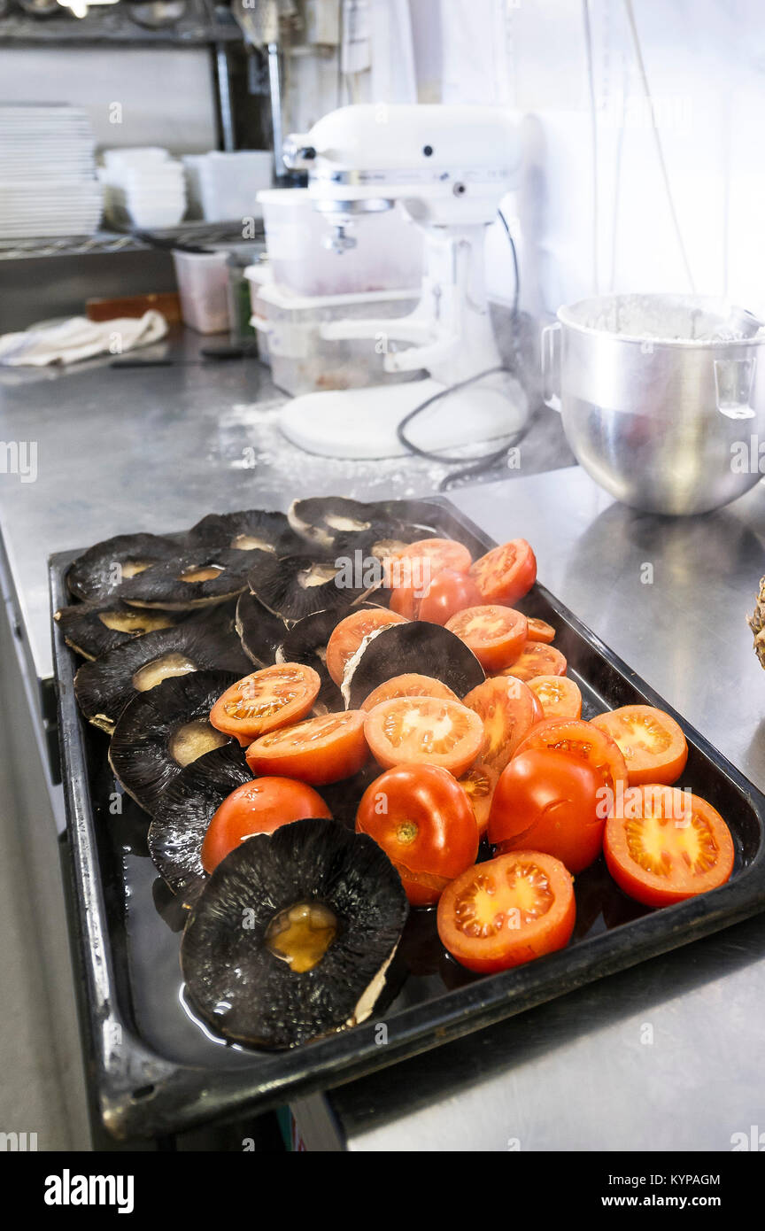 Food preparation in a restaurant kitchen Stock Photo - Alamy