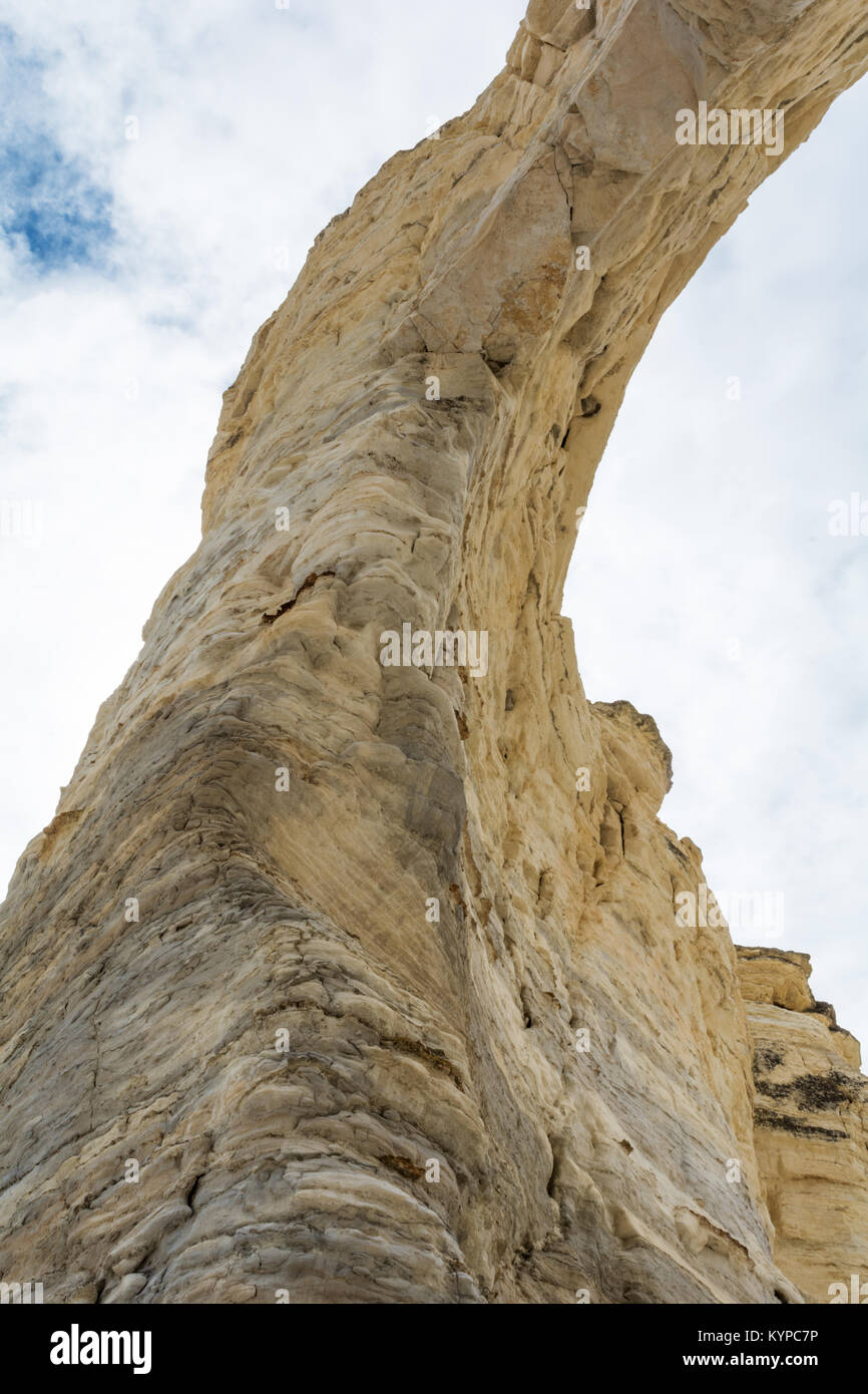 A limestone arch reaches into a cloud covered sky Stock Photo - Alamy A limestone arch reaches into a cloud covered sky Stock Photo - Alamy