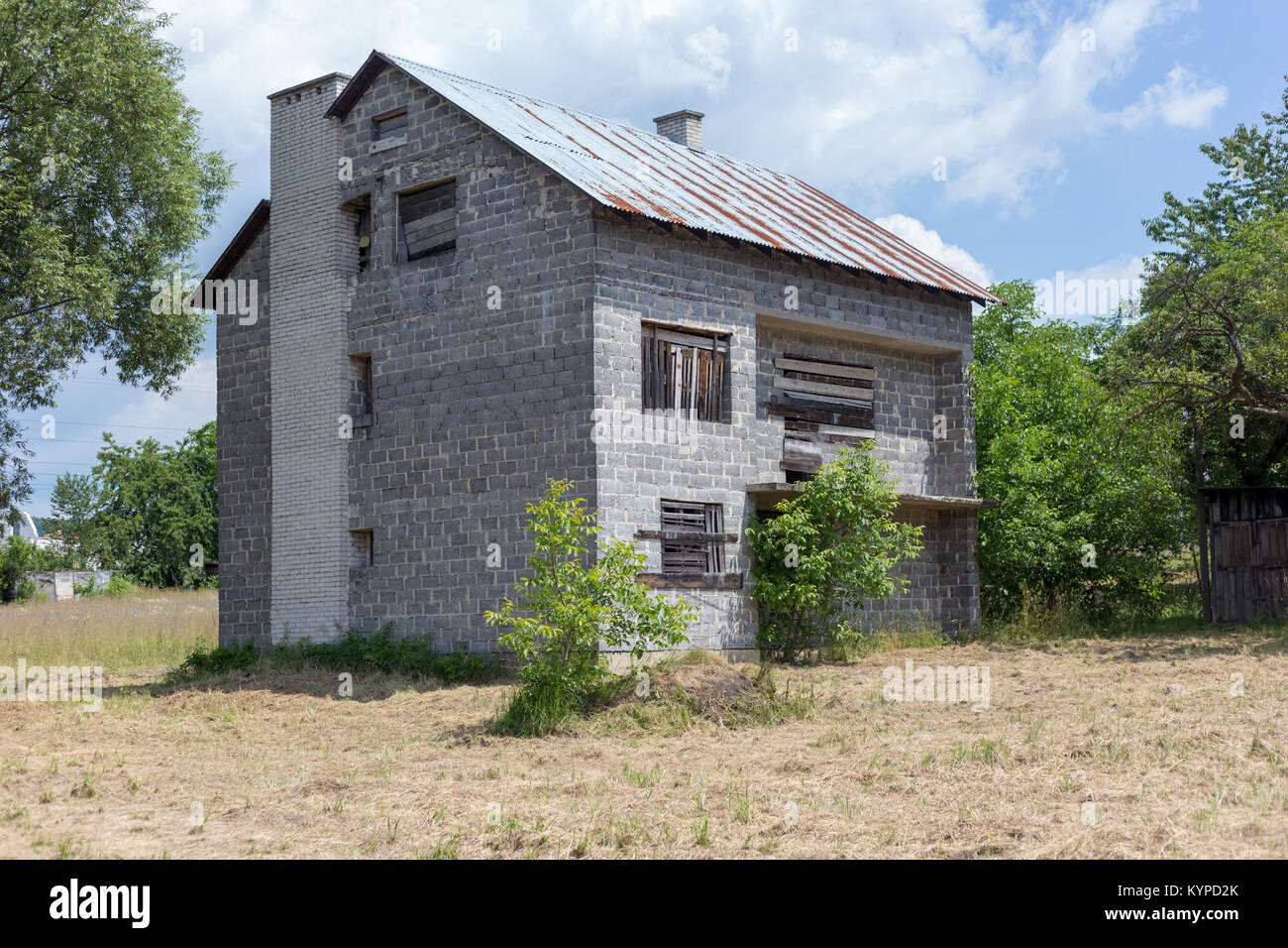 Unfinished, ruined and abandoned house Stock Photo - Alamy