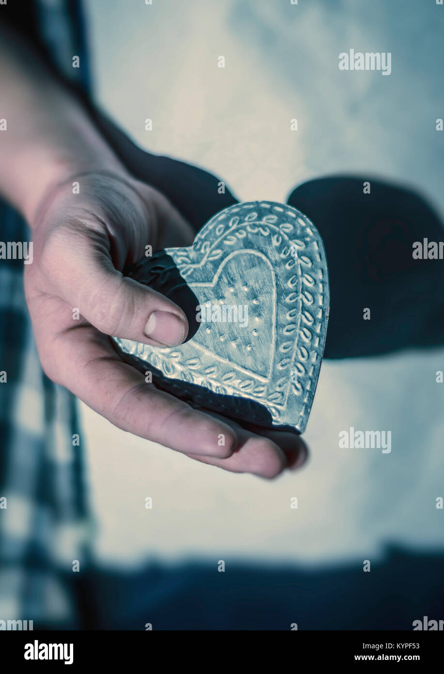 Heart in my hands Stock Photo - Alamy