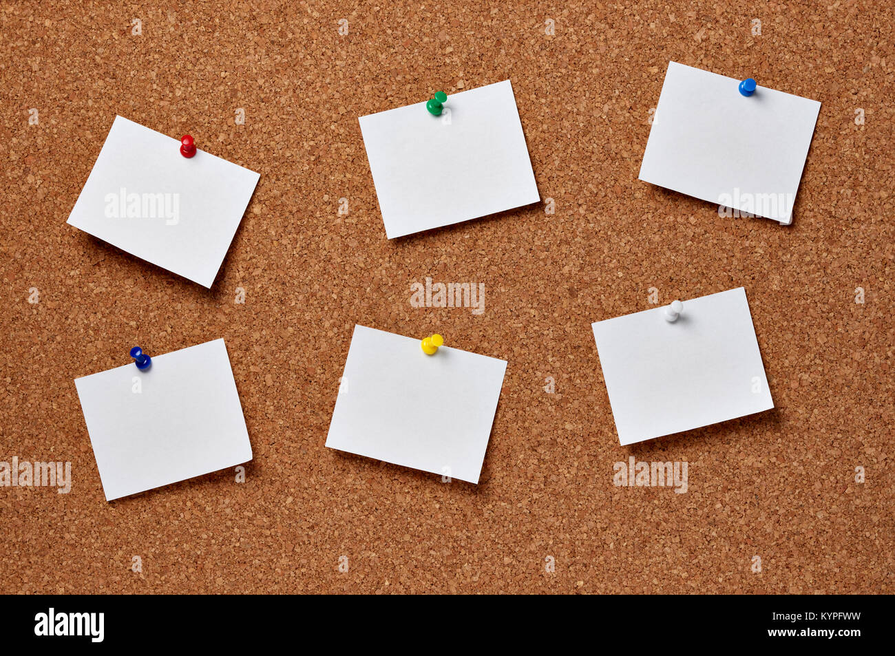 close up of note papers with pushpins on a corkboard Stock Photo - Alamy