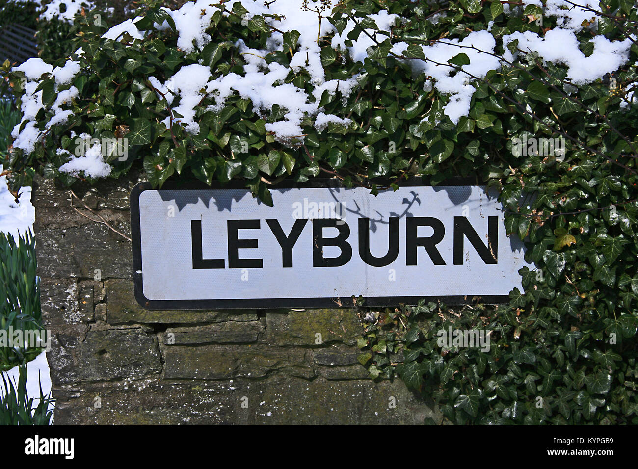 Road sign on wall saying Leyburn in the market town of Leyburn north ...