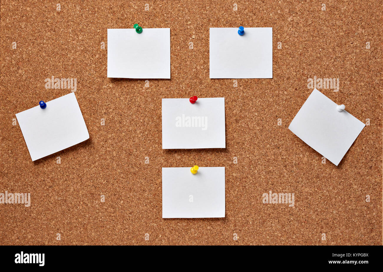 close up of note papers with pushpins on a corkboard Stock Photo - Alamy