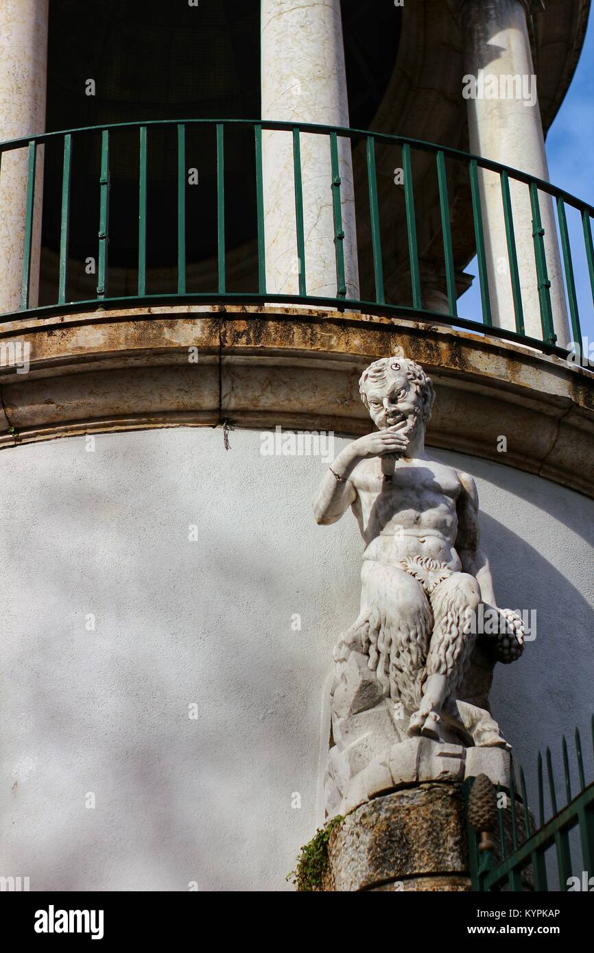 Stone dome with columns and statue in a Lisbon garden Stock Photo - Alamy