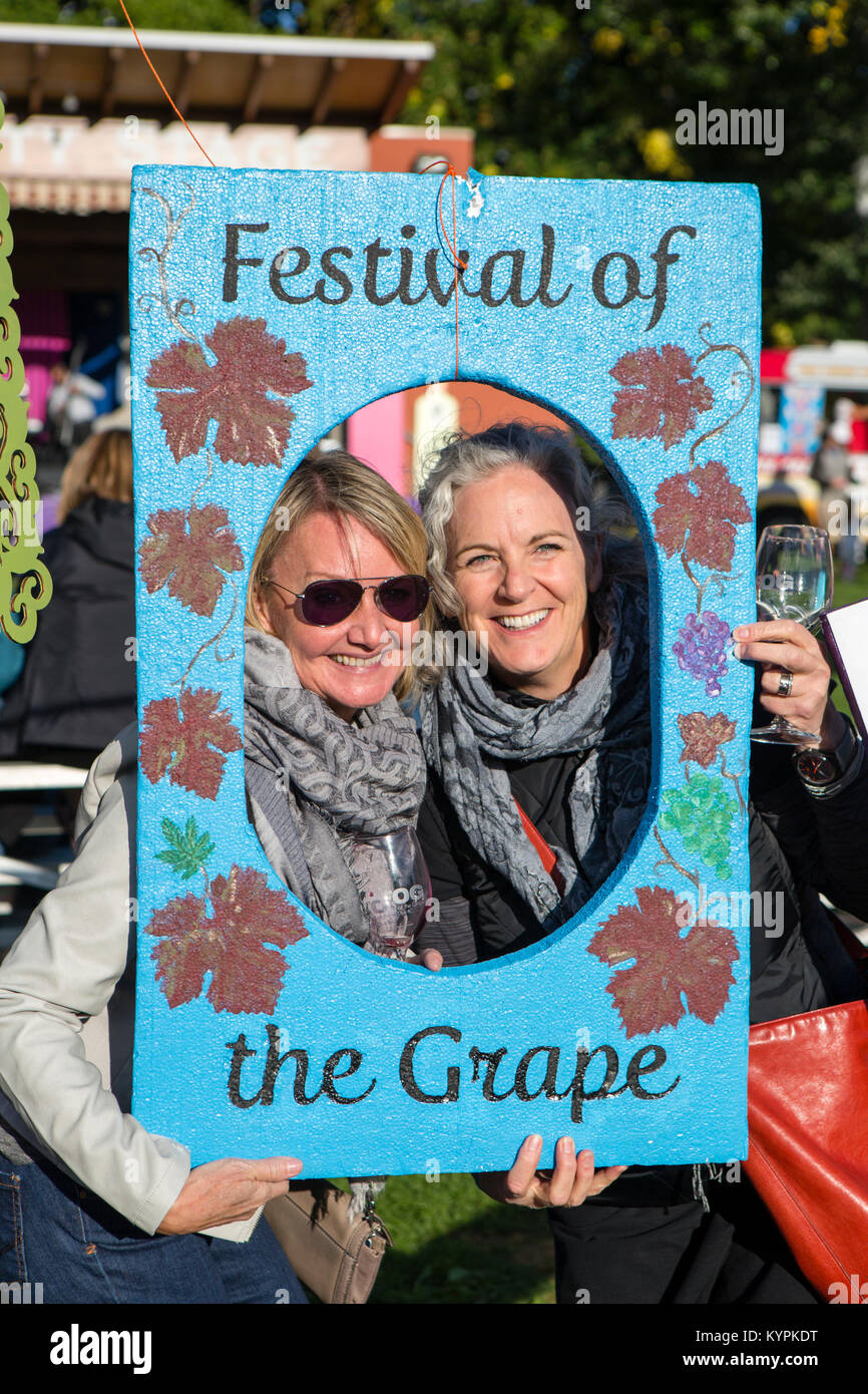 Visting attendees tasting the various wines that are on display at the ...