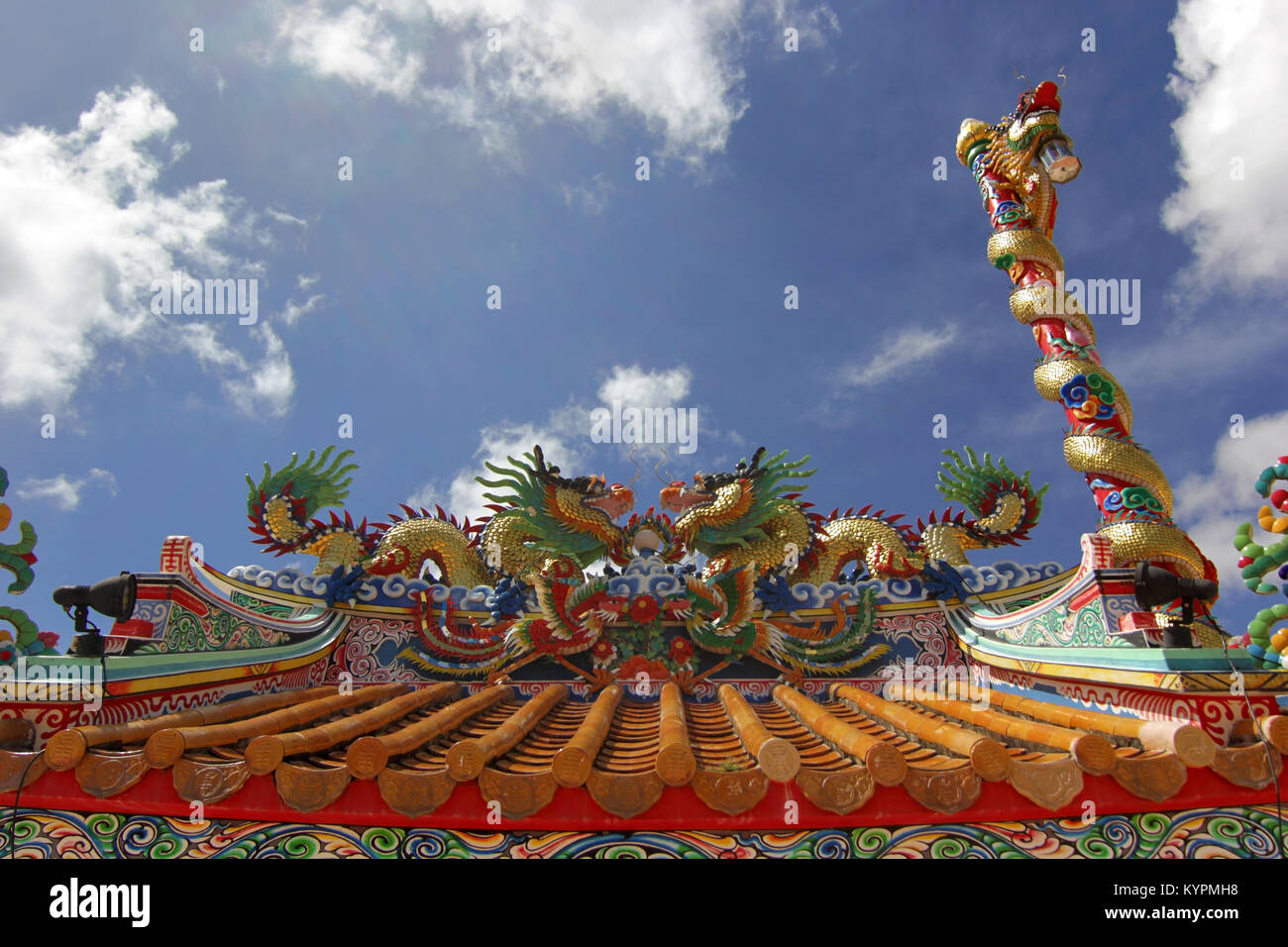 chinese dragon on the roof of shrine with beautiful sky background ...