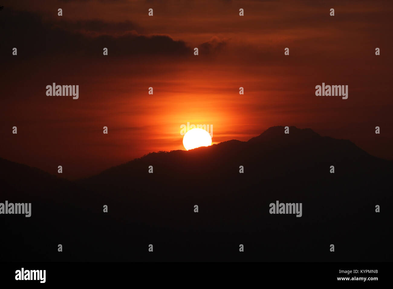 beautiful sunset over the hill, landscape photo Stock Photo - Alamy