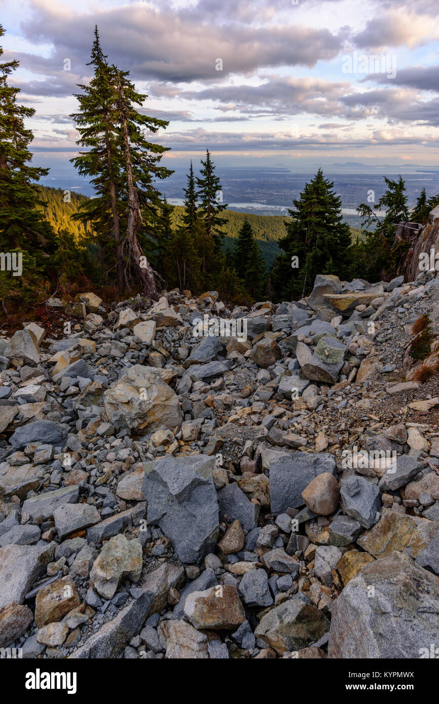 Road from boulders and rocks in the rocky mountains of Canada in a ...
