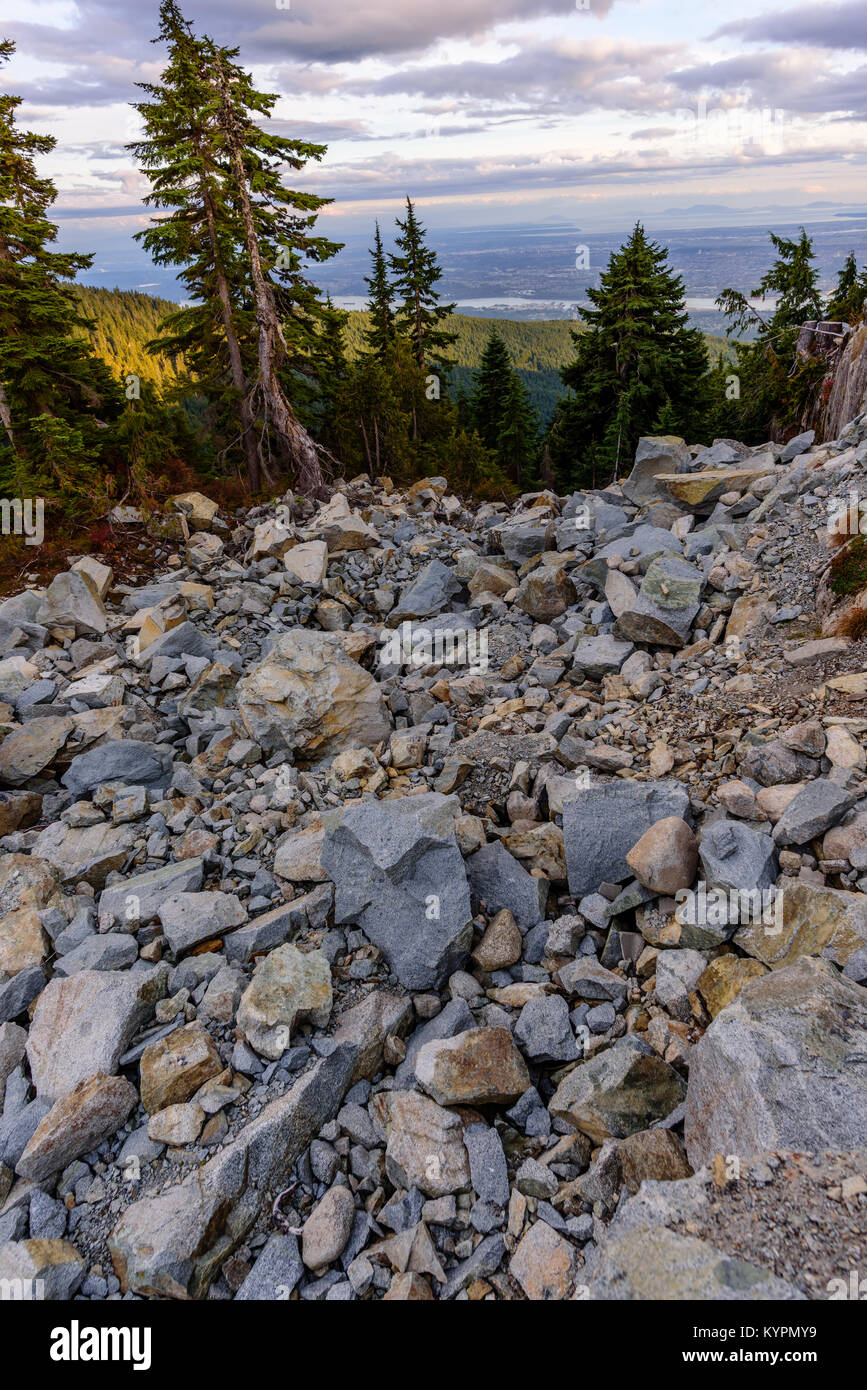 Road from boulders and rocks in the rocky mountains of Canada in a ...