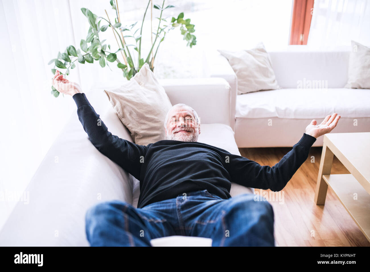 Senior man at home Stock Photo - Alamy