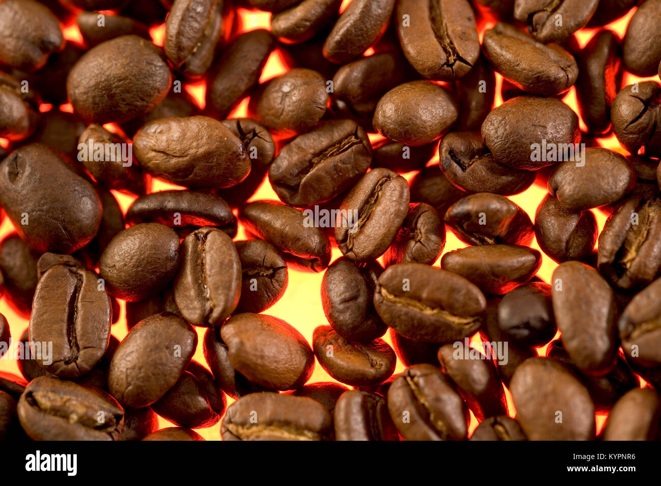 Glowing backlit coffee beans close up texture Stock Photo - Alamy