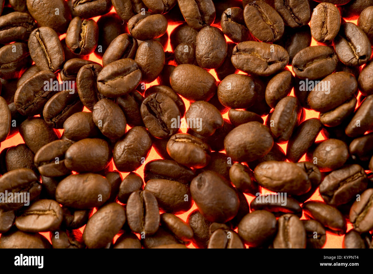Glowing backlit coffee beans close up texture Stock Photo - Alamy