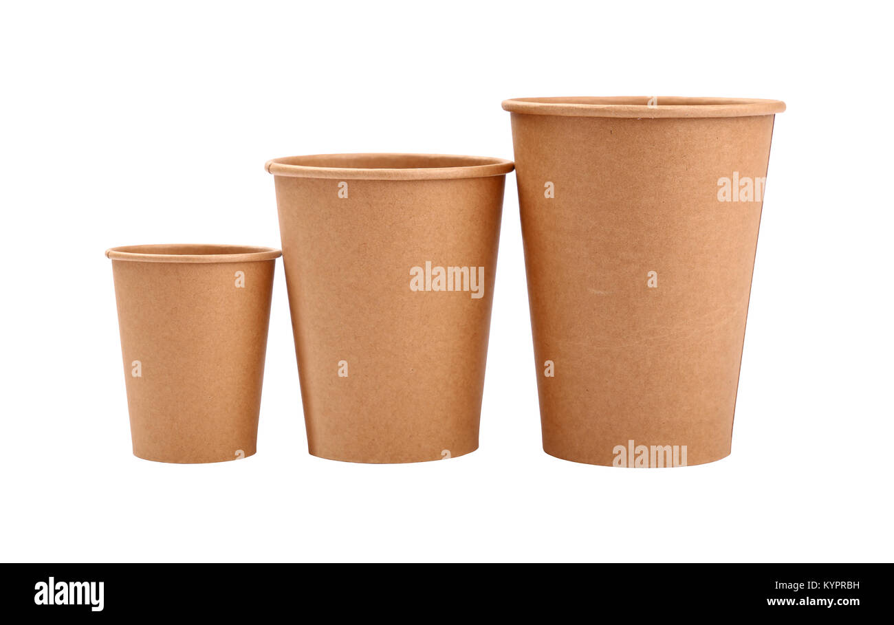 Close up group of three empty brown paper parchment coffee to go cups ...