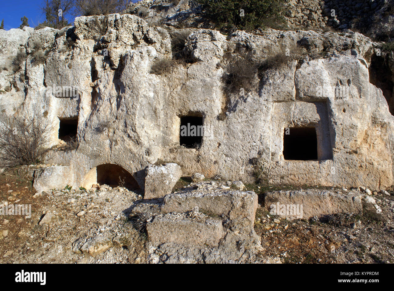 Caves and face of rock in Uzunjaburch, Turkey Stock Photo - Alamy