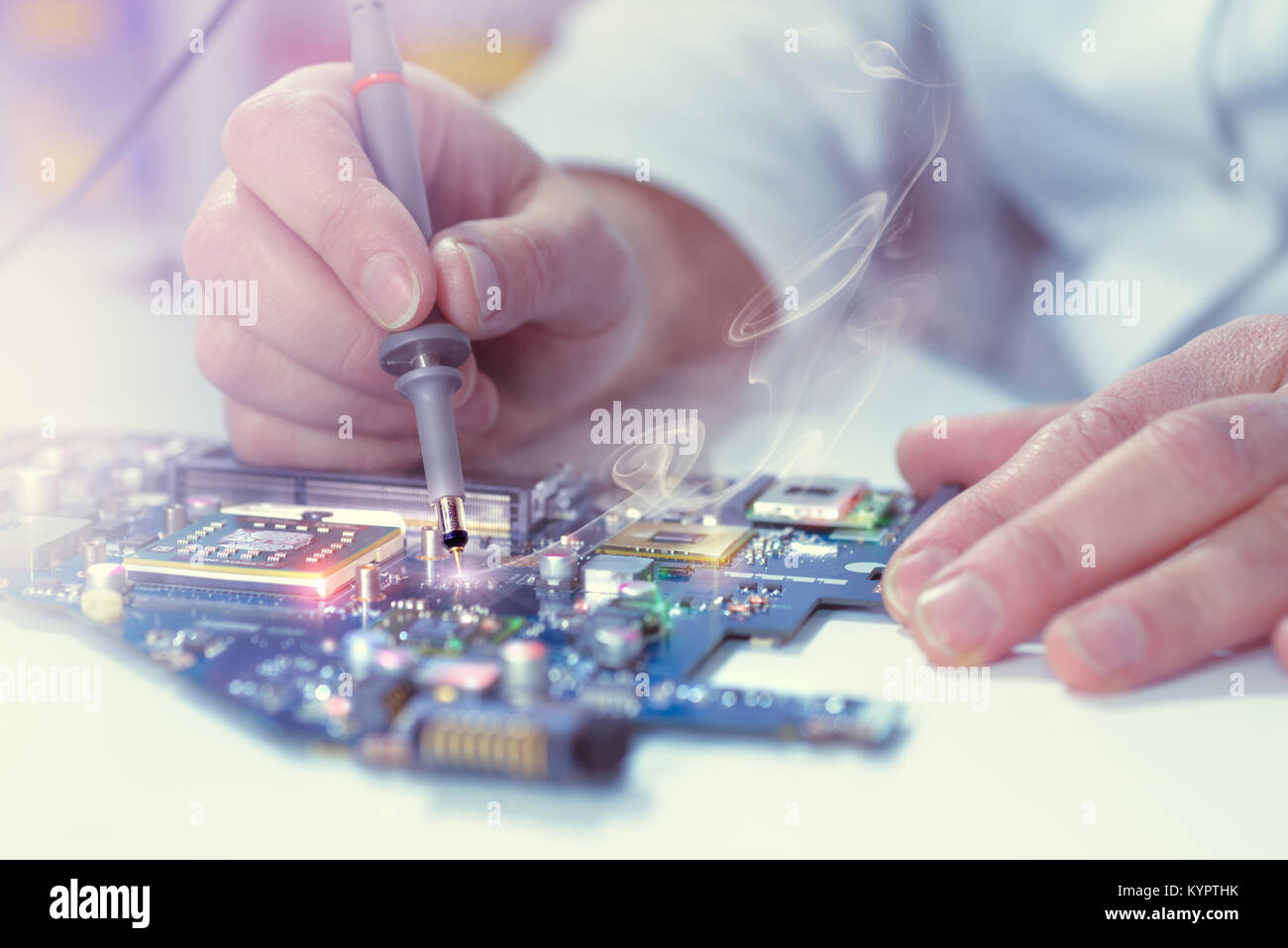 Technological background with closeup on tester checking motherboard ...