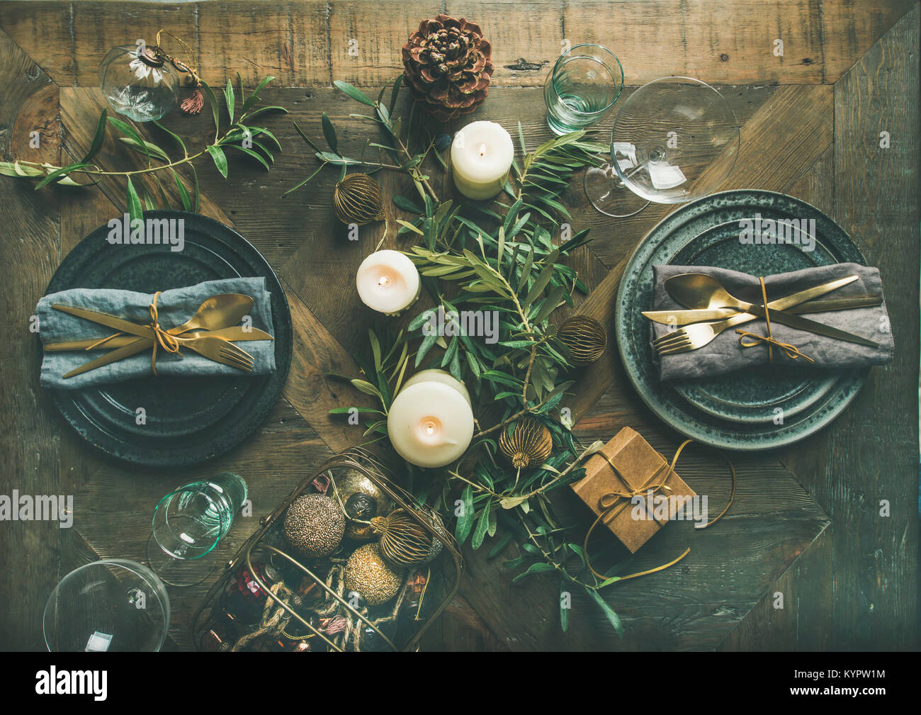 Christmas or New Years eve holiday table setting. Flat-lay of plates ...
