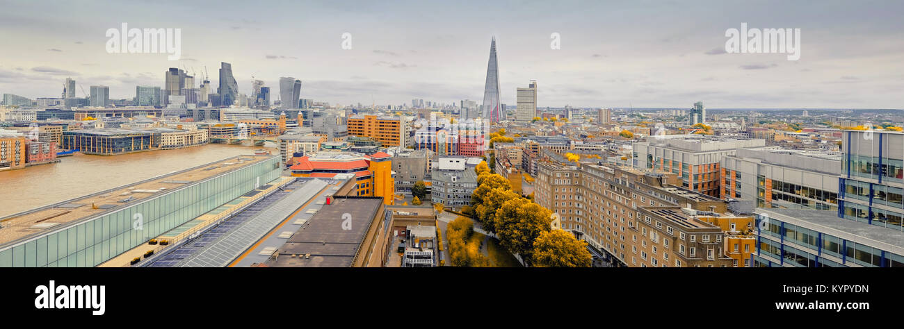 Panoramic aerial view with the Shard, skyscrapers of the City of London ...