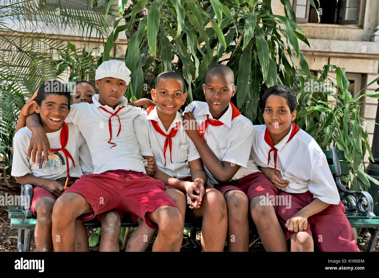 HAVANA, CUBA, MAY 5, 2009. A group of six young boys posing in school ...