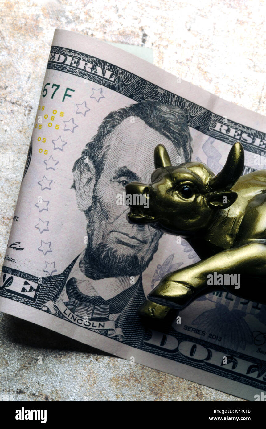 Dollar with bull Stock Photo - Alamy