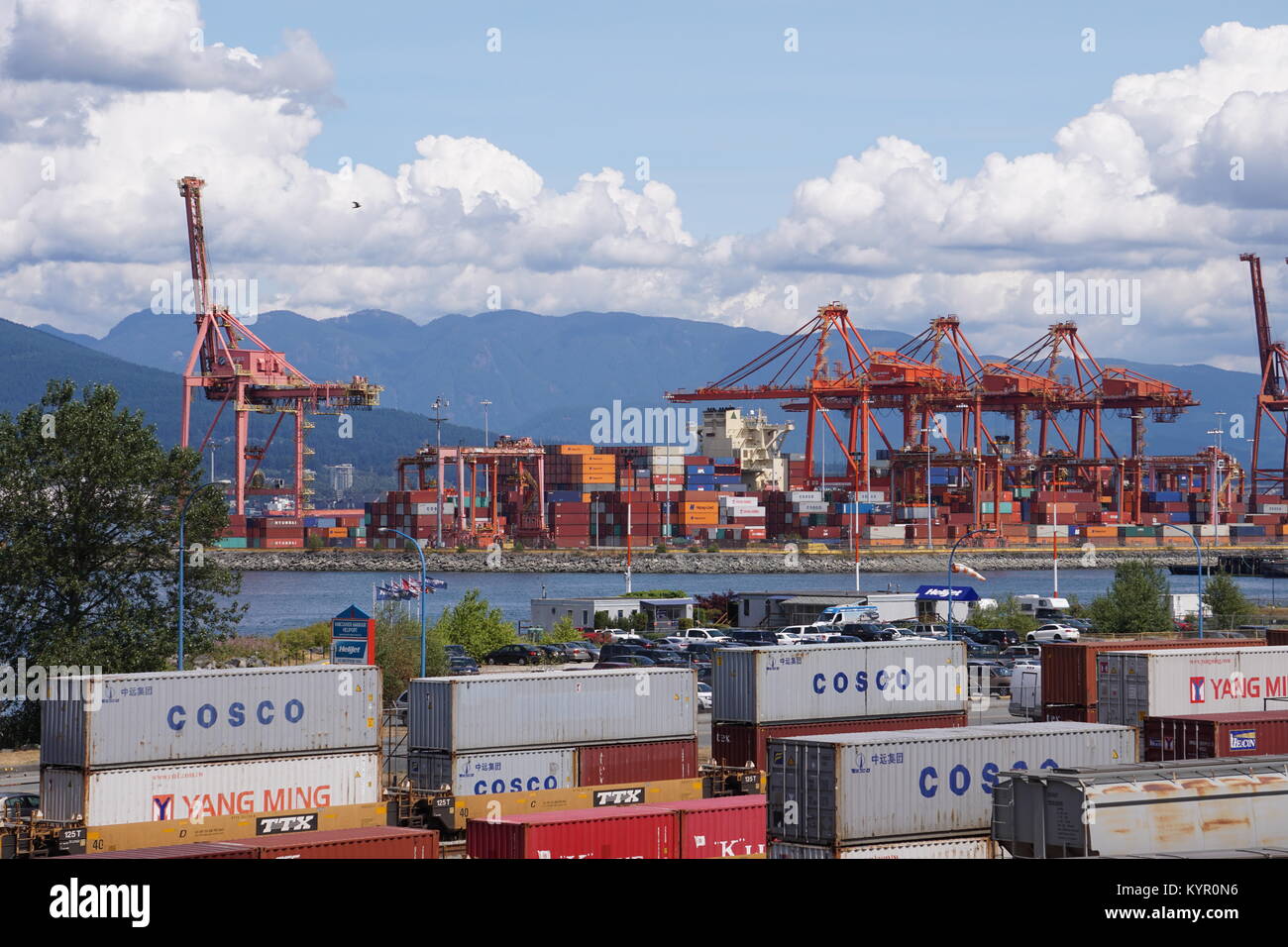 unloading at container port Stock Photo - Alamy