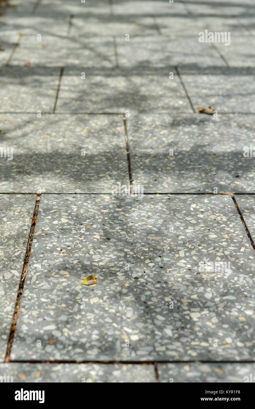 Shadows and patterns on the pavement and walkways around Riverway ...