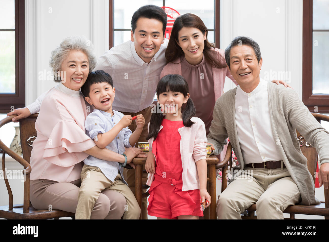 Multi generation family celebrating hi-res stock photography and images ...
