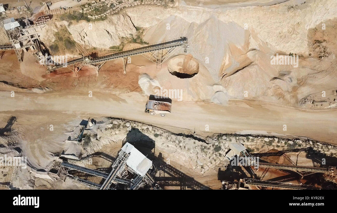 Large Quarry during work hours - Aerial image Stock Photo - Alamy