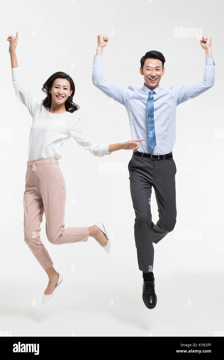 Young business person cheering Stock Photo - Alamy
