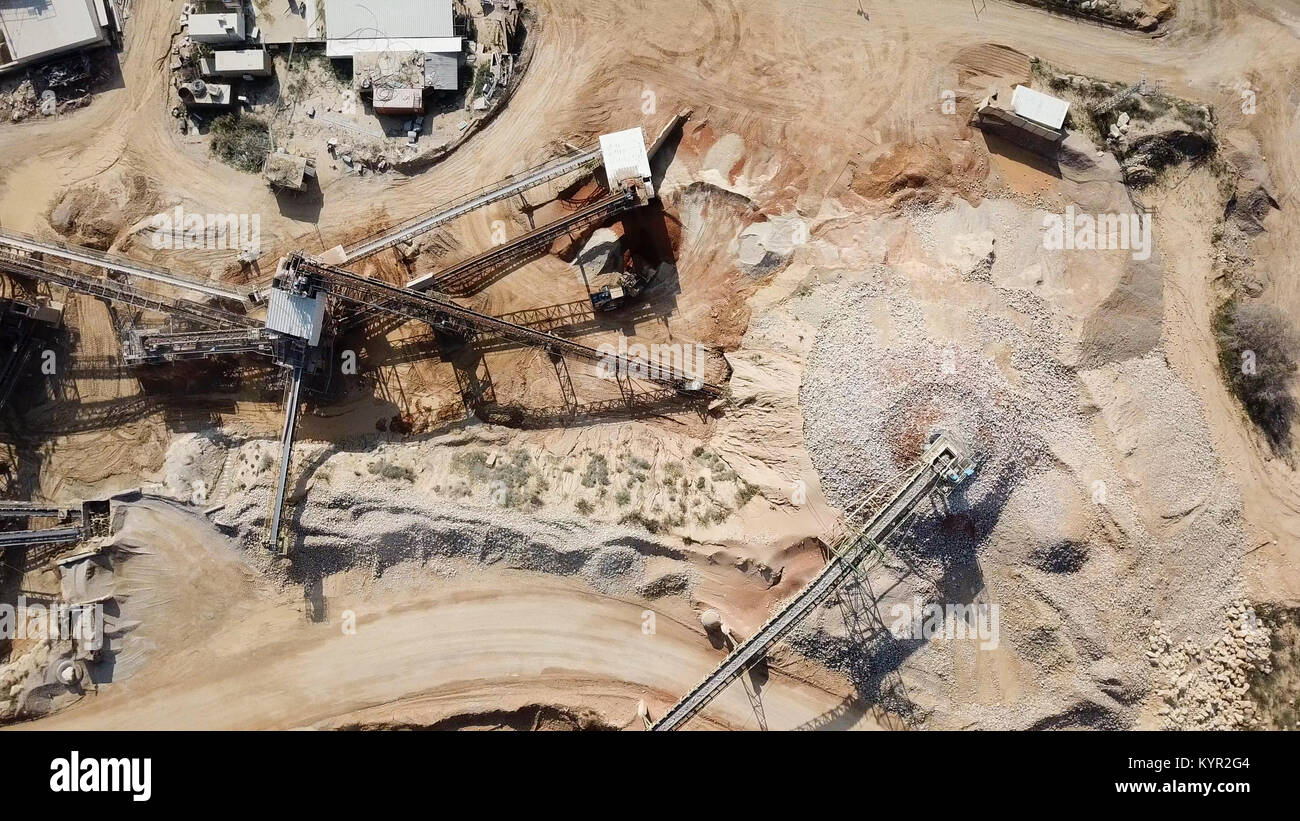Large Quarry during work hours - Aerial image Stock Photo - Alamy