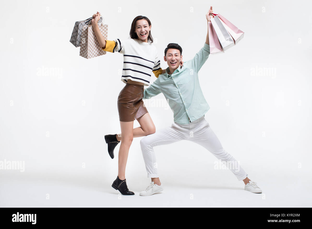 Cheerful shopping hi-res stock photography and images - Alamy