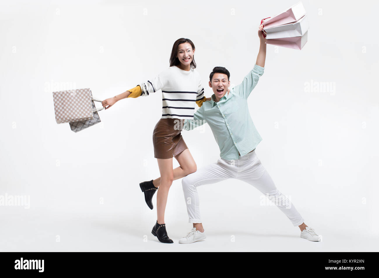 Cheerful shopping hi-res stock photography and images - Alamy