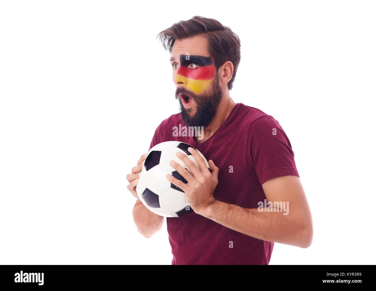 Shocked soccer fan with soccer ball Stock Photo - Alamy