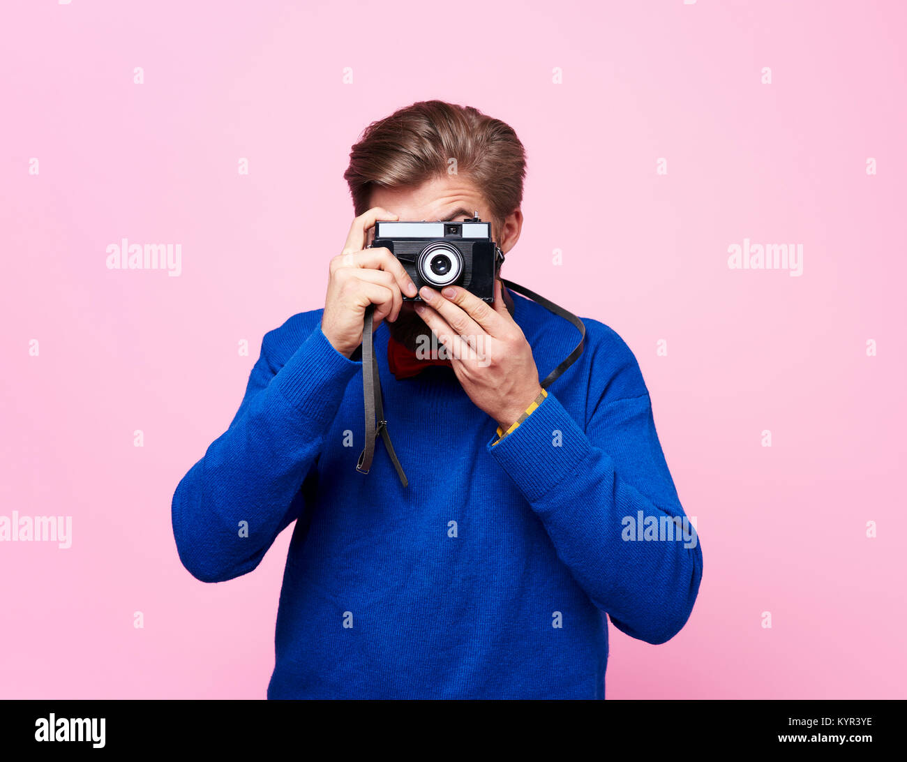 Front view of photographer at studio shot Stock Photo - Alamy
