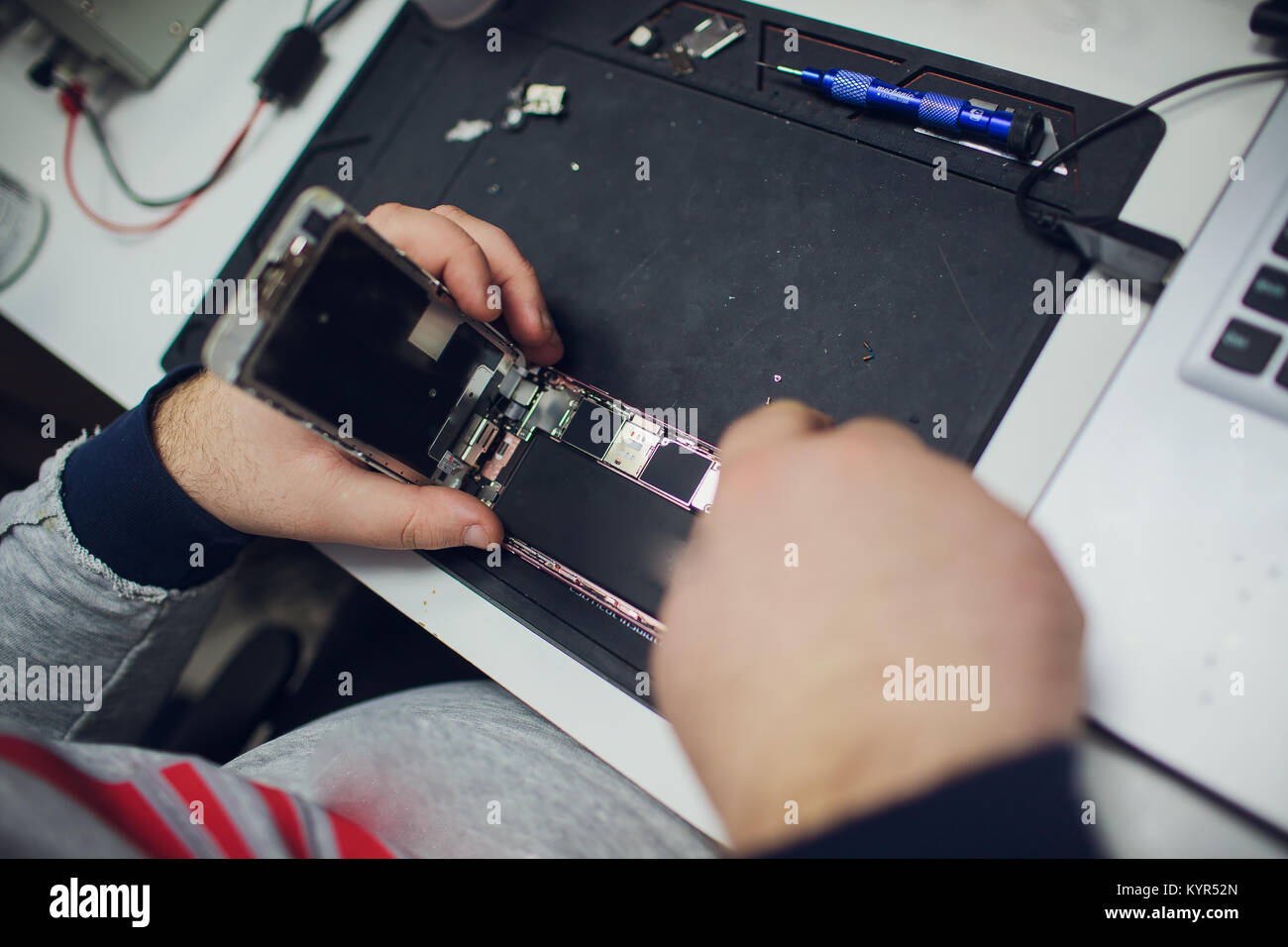 Close-up photos showing process of mobile phone repair Stock Photo - Alamy