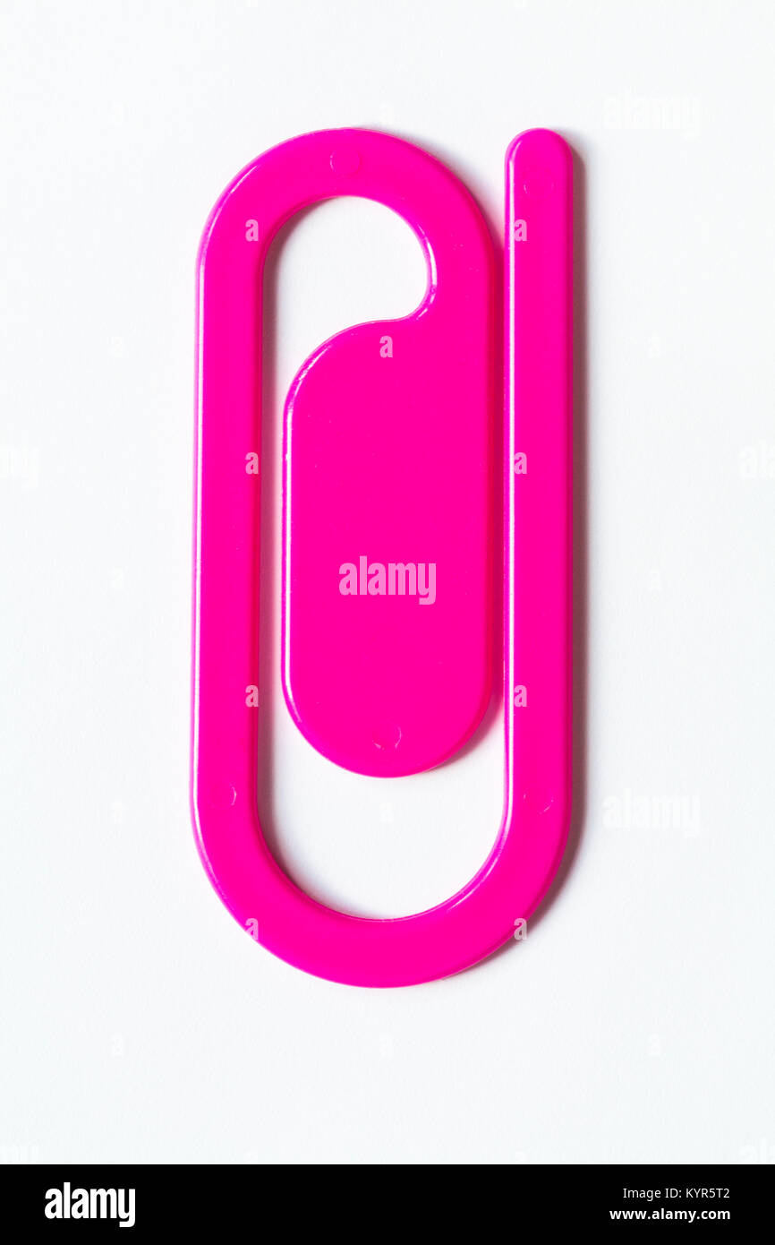 Huge pink paperclip, large big paper clip, isolated on white background ...