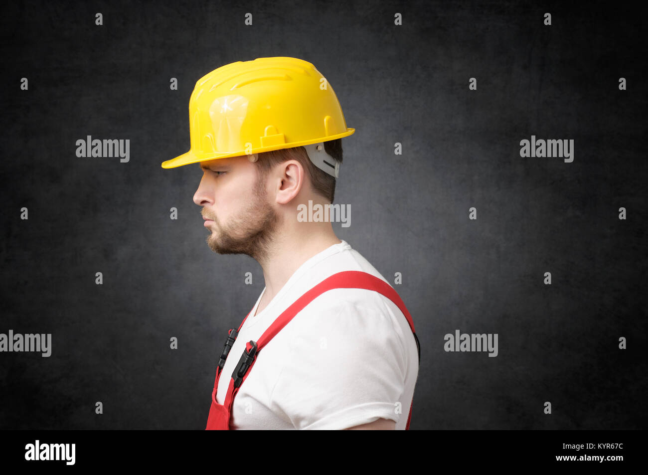 Frustrated construction worker Stock Photo - Alamy