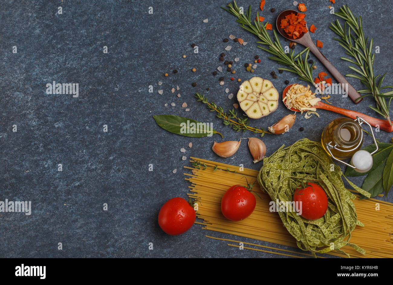 Selection of spices, pasta and greens. Ingredients for cooking pasta ...