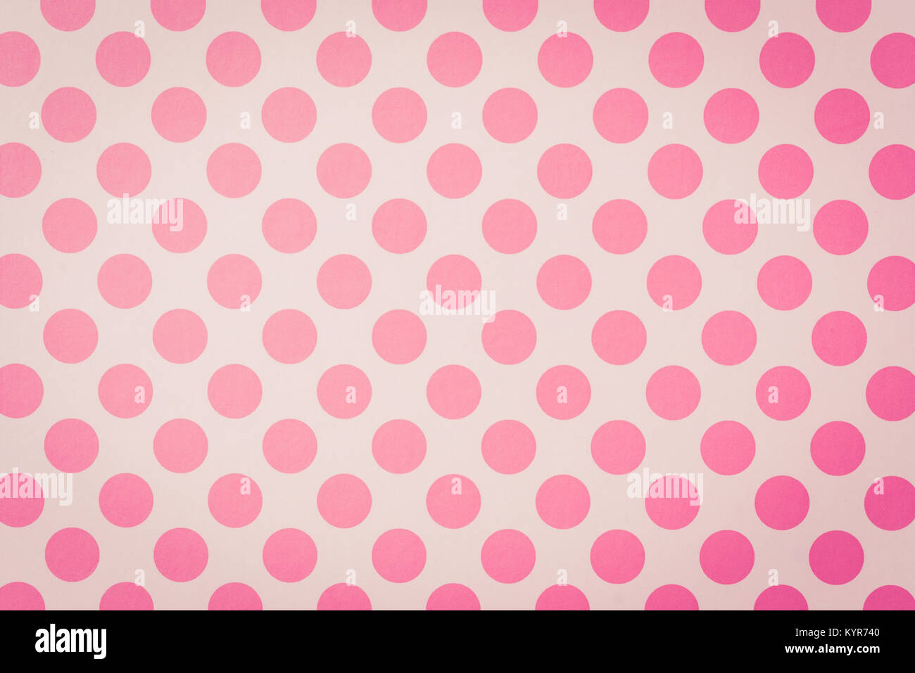 Pink dotted paper background Stock Photo - Alamy