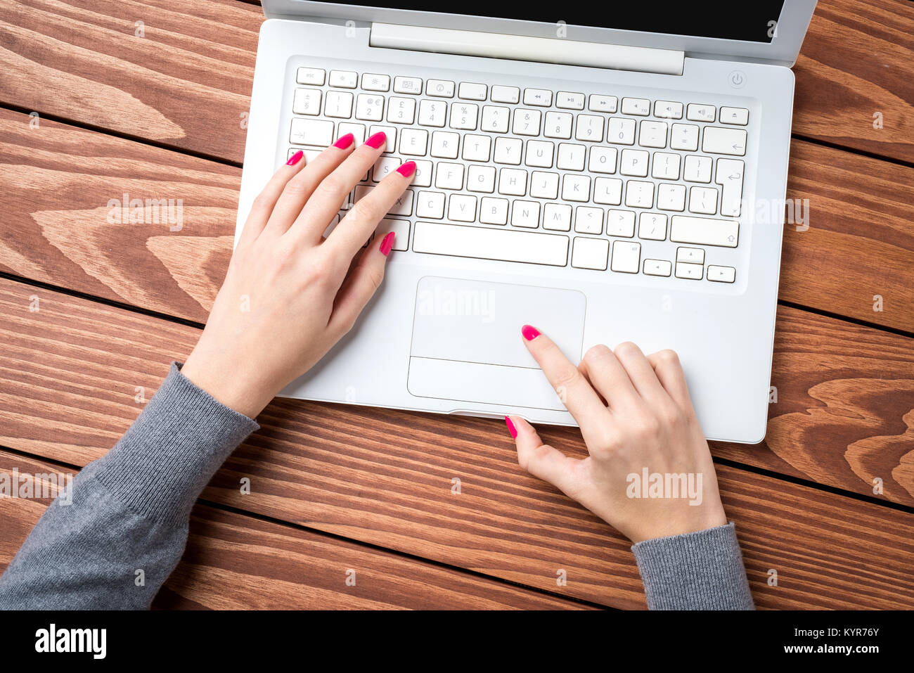 Overhead shot of woman using modern computer Stock Photo - Alamy