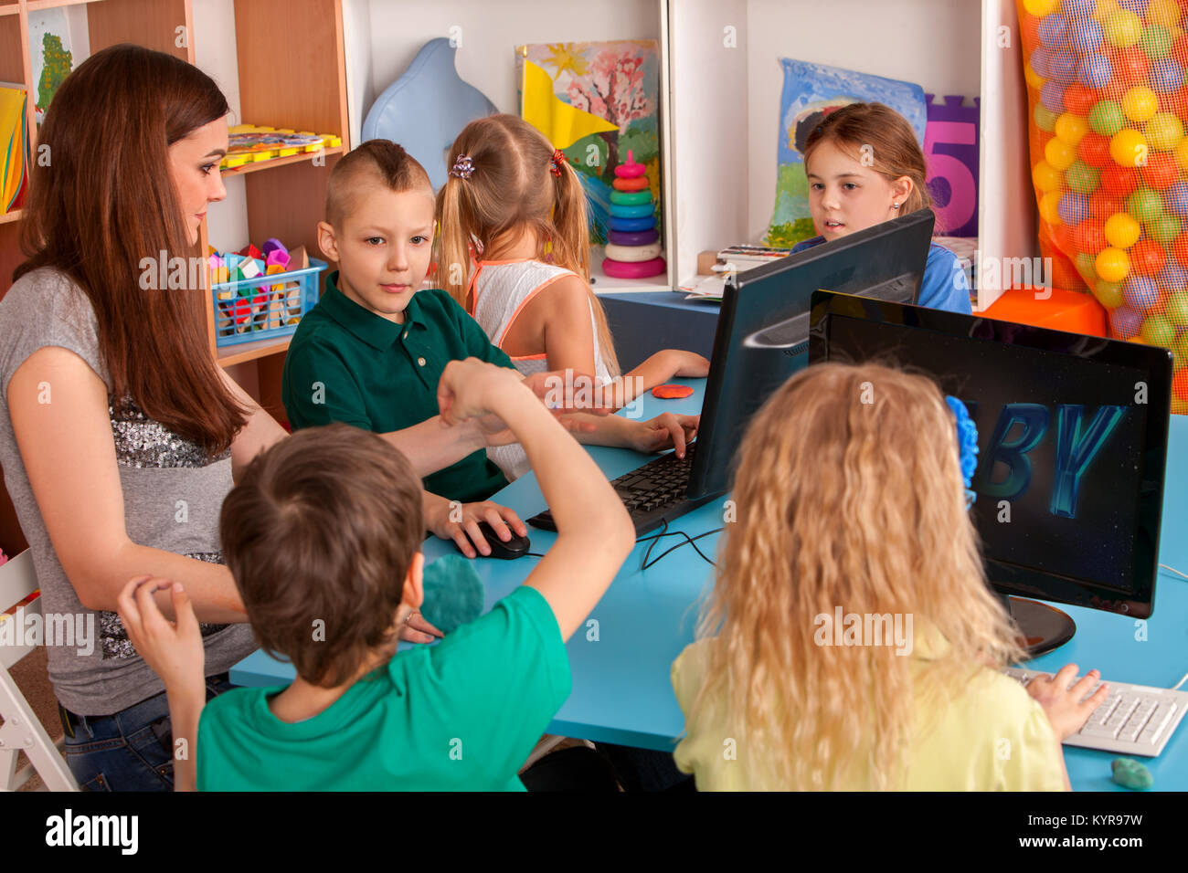 Children computer class us for education and video game Stock Photo - Alamy