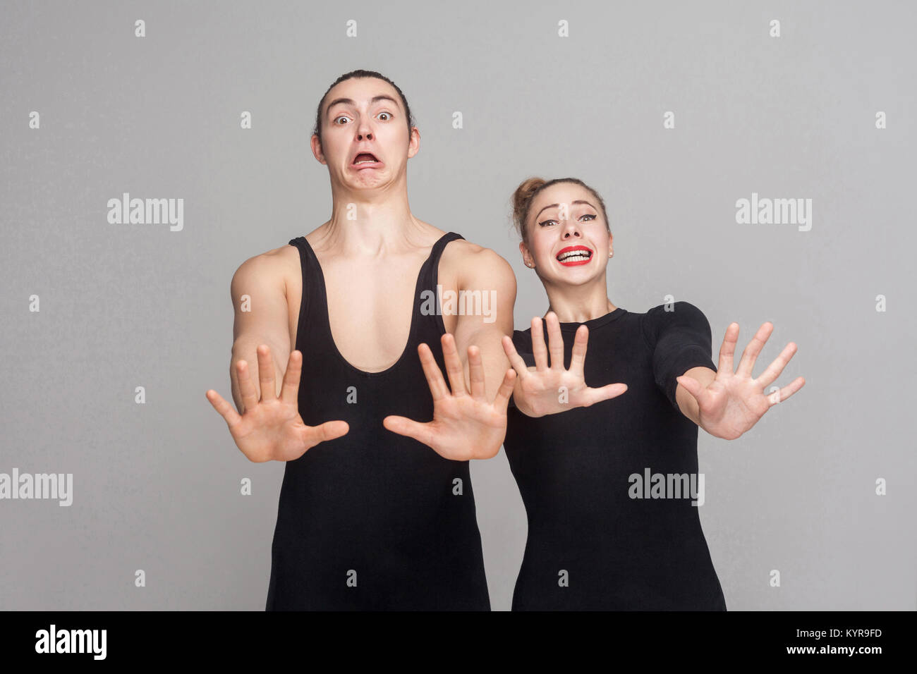 Fear! Couple afraidand have a scared and stressed look. Studio shot ...