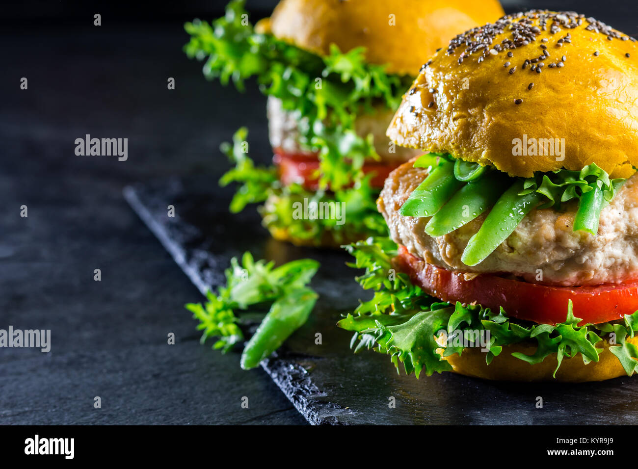 Yellow burgers hi-res stock photography and images - Alamy