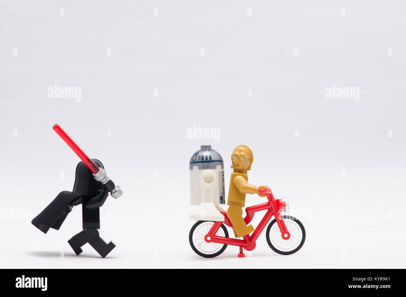 lego darth vader chasing c3po and r2d2. isolated on white background ...