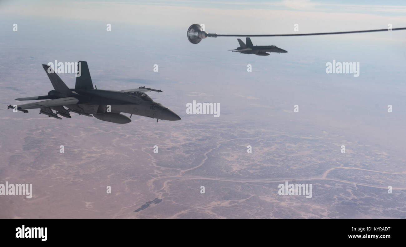 U.S. Navy F/A-18 Superhornets perform refueling operations with a U.S ...