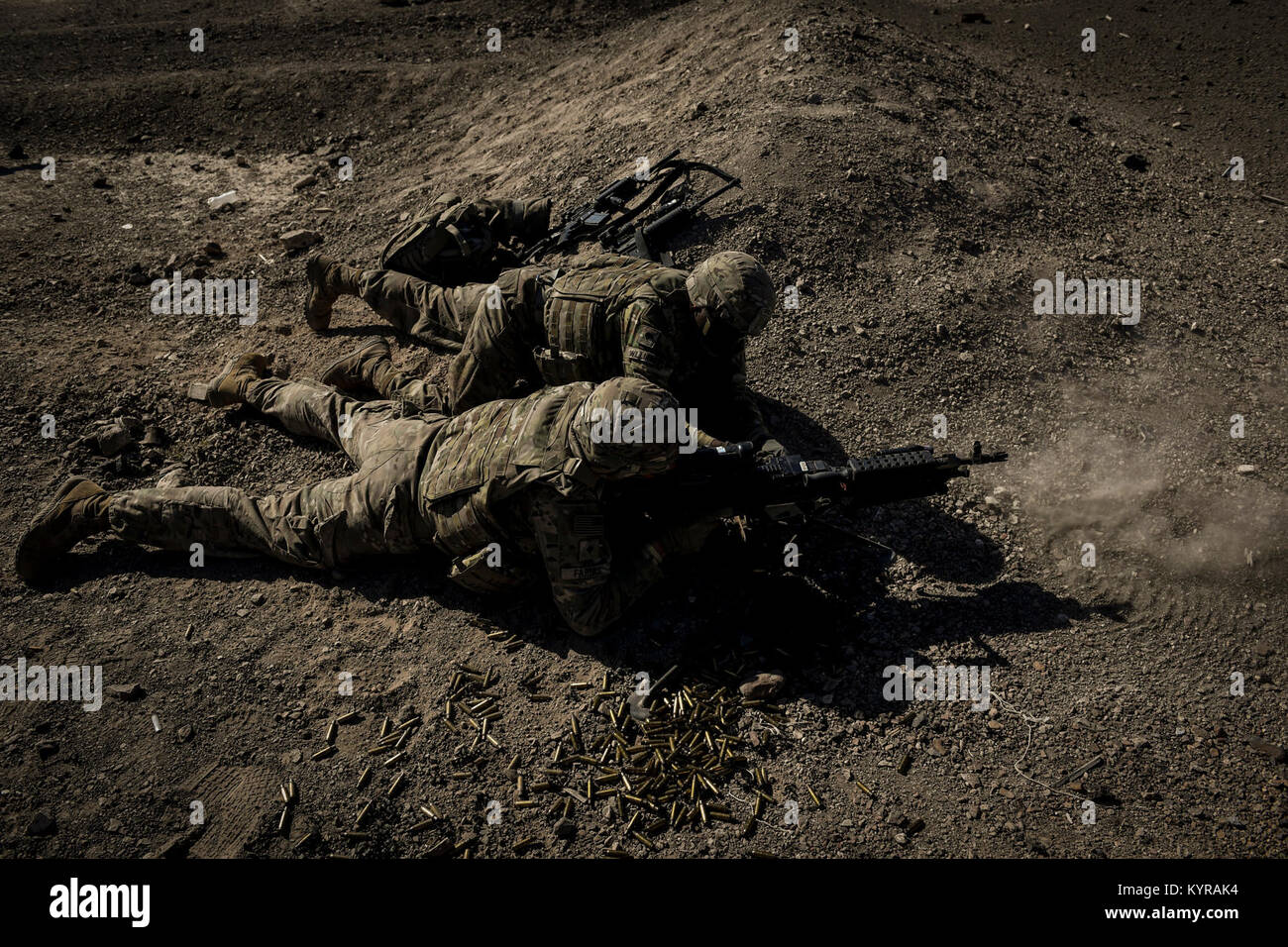 U.S. Army Spcs. Jason Farias, machine gunner, front, and Darius ...